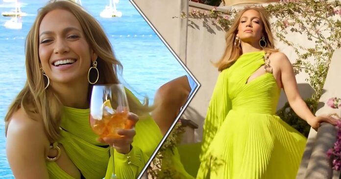 Jennifer Lopez Picks A Bright Neon Cut-Out Flowy Dress To Look Alluring ...